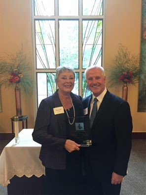 Greg Unruh, President, Franciscan Foundation presented Sharon Snuffin ...