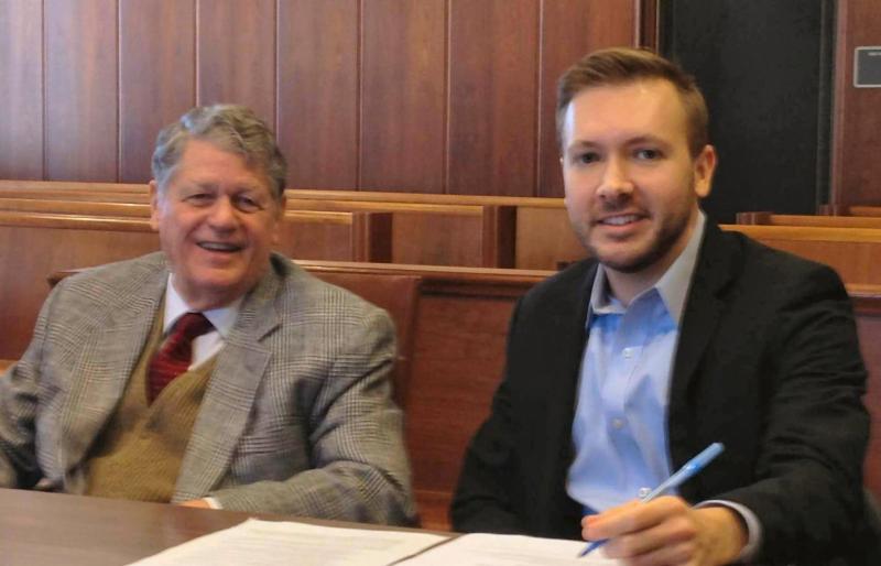 Attorneys William Prosch and Kenneth Boyles volunteer at the Help Desk