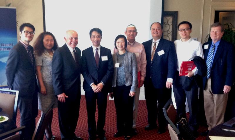 Commissioner Clement Leung (4th left) with some members of the audience.