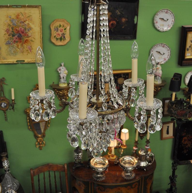 A skeleton rocking chair from the Estate of Vincent Price, tin toys and ...