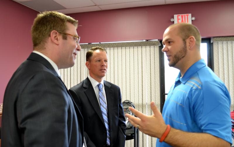 At left, The Ohio Development Services Agency's Assistant Director Ryan ...